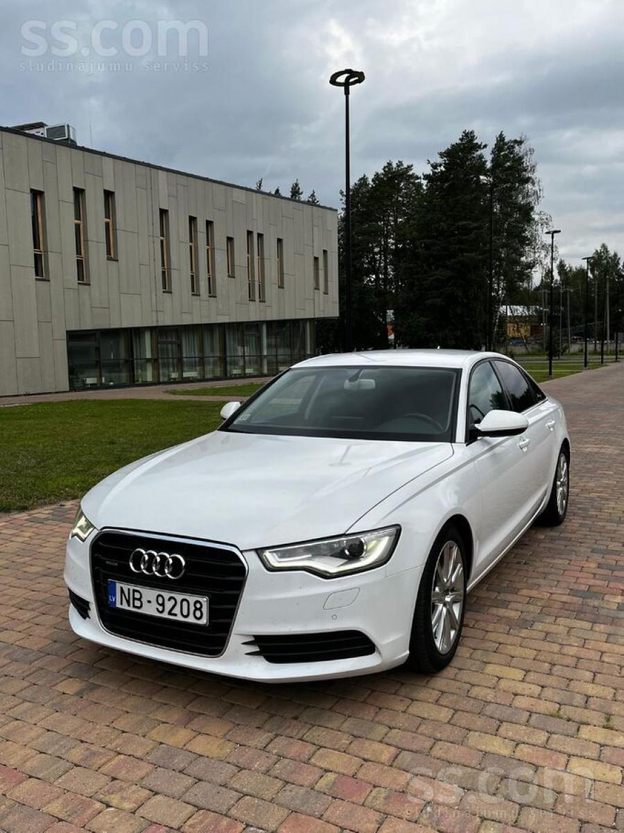 White Audi A6 2013 in Riga, with an engine capacity of 3.00 L and mileage of 230 thousand km for 10350 €, photo 8 on AUTOMOTO.COM.LV