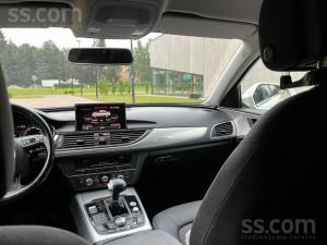 White Audi A6 2013 in Riga, with an engine capacity of 3.00 L and mileage of 230 thousand km for 10350 €, photo 12 on AUTOMOTO.COM.LV