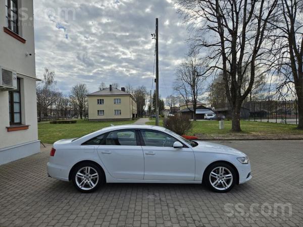 White Audi A6 2014 in Riga, with an engine capacity of 3.00 L and mileage of 327 thousand km for 10200 €, photo 8 on AUTOMOTO.COM.LV