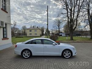 White Audi A6 2014 in Riga, with an engine capacity of 3.00 L and mileage of 327 thousand km for 10200 €, photo 9 on AUTOMOTO.COM.LV