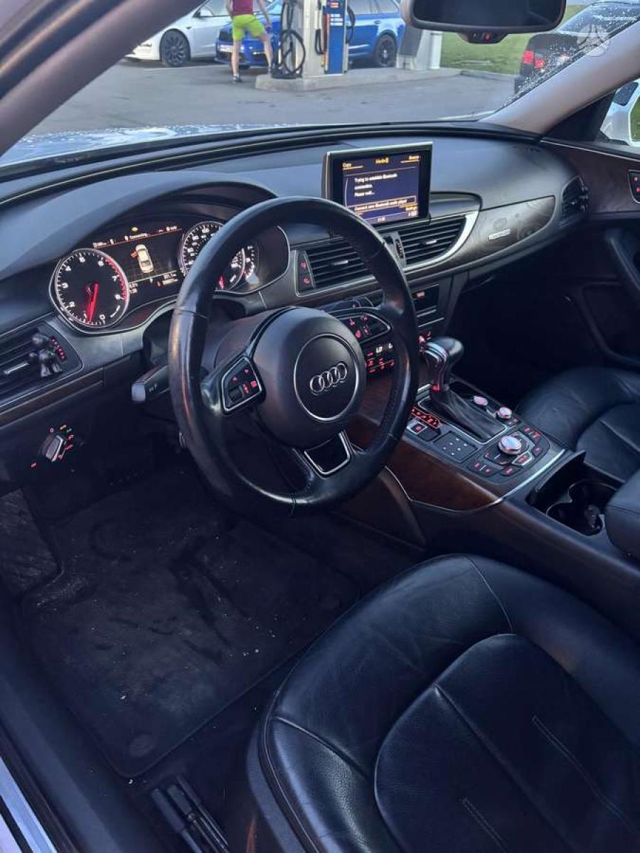 White Audi A6 2014 in Vilnius, with an engine capacity of 1.98 L and mileage of 200 thousand km for 7100 €, photo 6 on AUTOMOTO.COM.LV