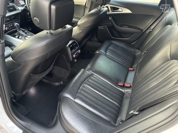 White Audi A6 2015 in Panevezys, with an engine capacity of 3.00 L and mileage of 324 thousand km for 7600 €, photo 10 on AUTOMOTO.COM.LV