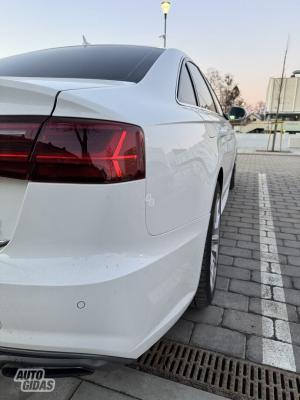 White Audi A6 2016 in Kaunas, with an engine capacity of 2.00 L and mileage of 206 thousand km for 14750 €, photo 7 on AUTOMOTO.COM.LV