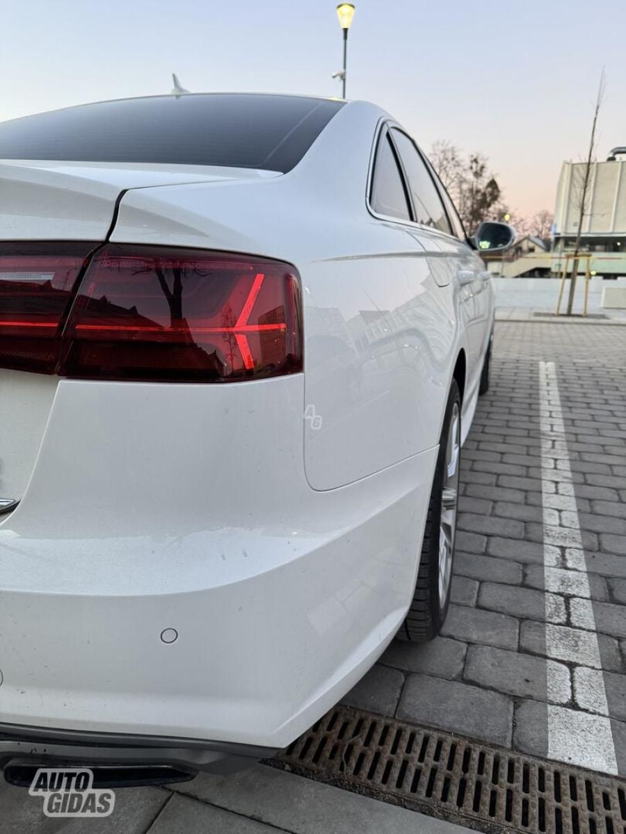 White Audi A6 2016 in Kaunas, with an engine capacity of 2.00 L and mileage of 206 thousand km for 14750 €, photo 7 on AUTOMOTO.COM.LV