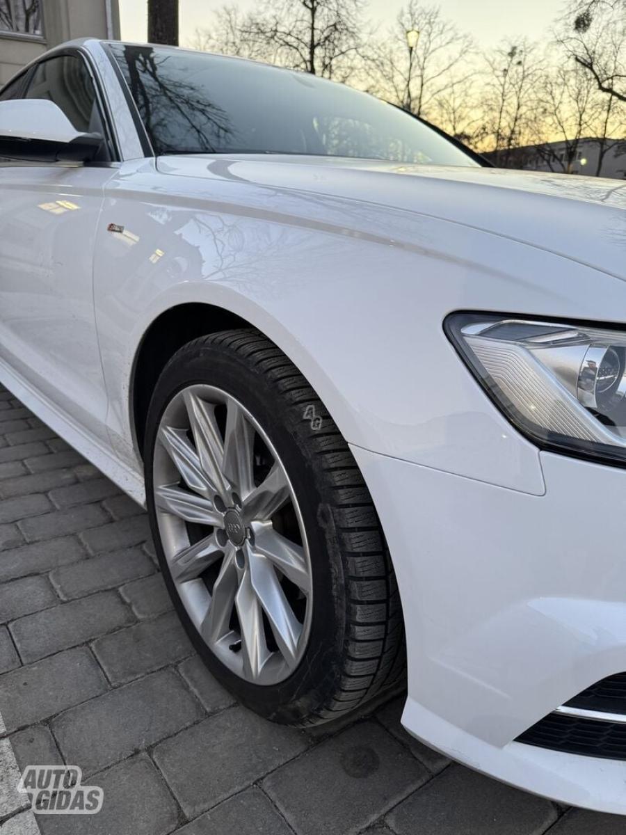 White Audi A6 2016 in Kaunas, with an engine capacity of 2.00 L and mileage of 206 thousand km for 14750 €, photo 9 on AUTOMOTO.COM.LV