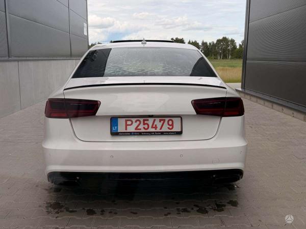 White Audi A6 2016 in Siauliai, with an engine capacity of 3.00 L and mileage of 257 thousand km for 14900 €, photo 5 on AUTOMOTO.COM.LV
