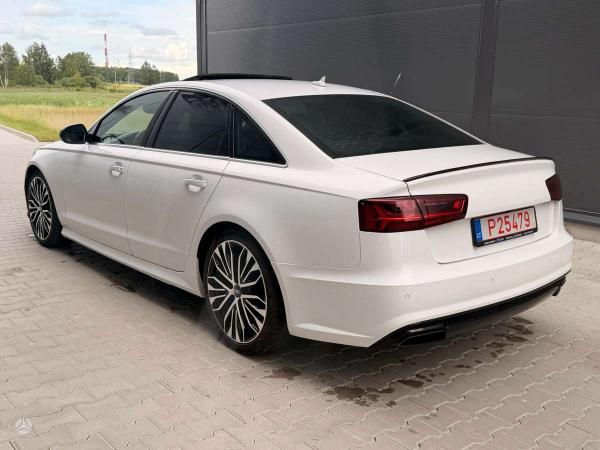 White Audi A6 2016 in Siauliai, with an engine capacity of 3.00 L and mileage of 257 thousand km for 14900 €, photo 6 on AUTOMOTO.COM.LV