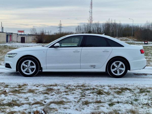 White Audi A6 2017 in Jonava, with an engine capacity of 2.00 L and mileage of 227 thousand km for 14990 €, photo 4 on AUTOMOTO.COM.LV