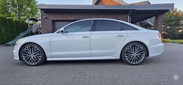 White Audi A6 2017 in Vilnius, with an engine capacity of 1.98 L and mileage of 136 thousand km for 12900 €, photo 3 on AUTOMOTO.COM.LV