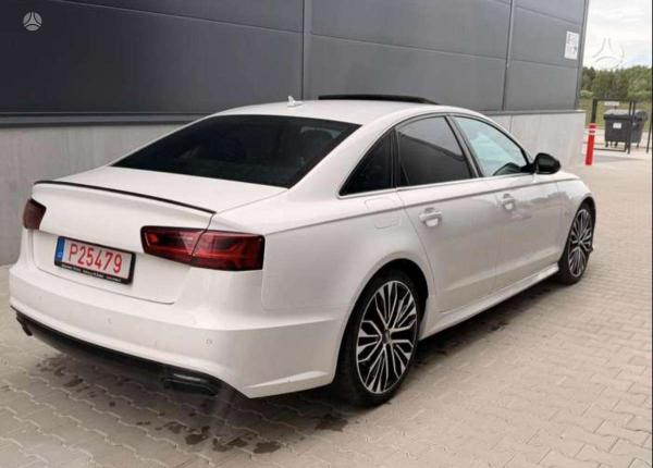 White Audi A6 2017 in Siauliai, with an engine capacity of 3.00 L and mileage of 233 thousand km for 15999 €, photo 2 on AUTOMOTO.COM.LV