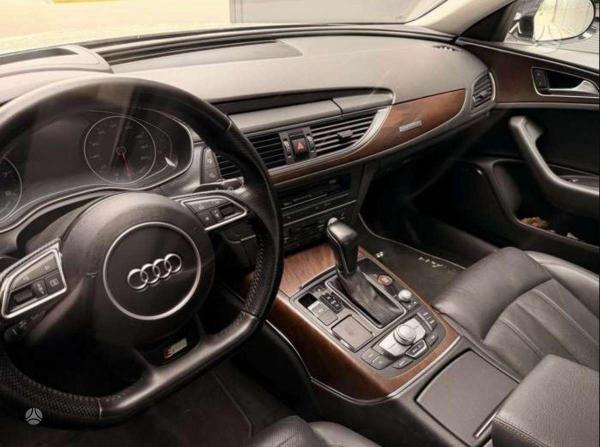 White Audi A6 2017 in Siauliai, with an engine capacity of 3.00 L and mileage of 233 thousand km for 15999 €, photo 8 on AUTOMOTO.COM.LV