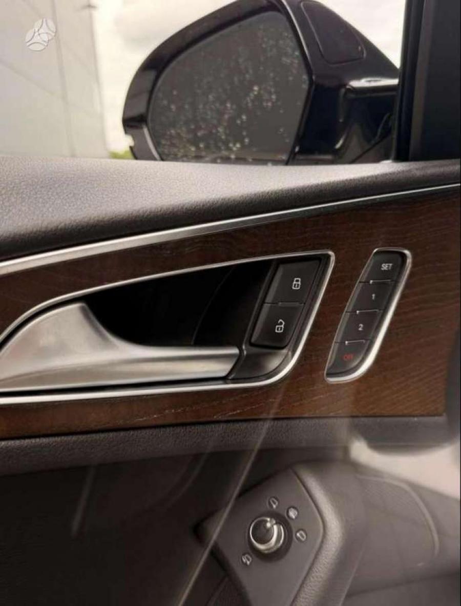 White Audi A6 2017 in Siauliai, with an engine capacity of 3.00 L and mileage of 233 thousand km for 15999 €, photo 12 on AUTOMOTO.COM.LV