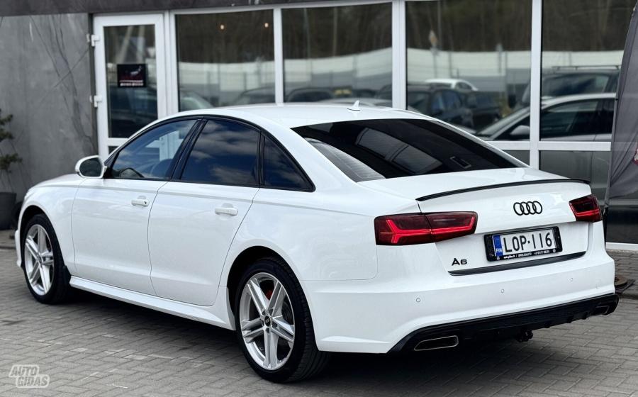 White Audi A6 2018 in Radviliskis, with an engine capacity of 2.00 L and mileage of 236 thousand km for 14200 €, photo 12 on AUTOMOTO.COM.LV