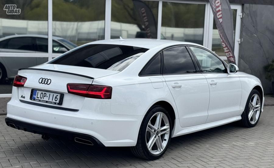 White Audi A6 2018 in Radviliskis, with an engine capacity of 2.00 L and mileage of 236 thousand km for 14200 €, photo 13 on AUTOMOTO.COM.LV