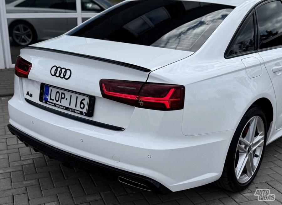 White Audi A6 2018 in Radviliskis, with an engine capacity of 2.00 L and mileage of 236 thousand km for 14200 €, photo 15 on AUTOMOTO.COM.LV