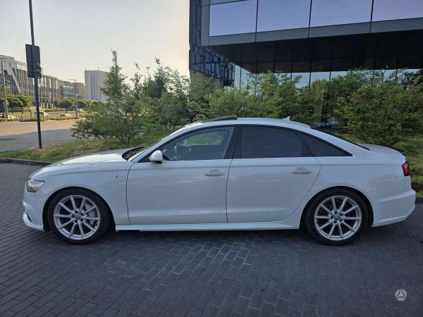White Audi A6 2018 in Vilnius, with an engine capacity of 3.00 L and mileage of 174 thousand km for 15499 €, photo 3 on AUTOMOTO.COM.LV