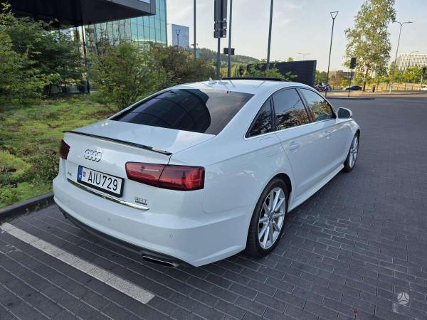 White Audi A6 2018 in Vilnius, with an engine capacity of 3.00 L and mileage of 174 thousand km for 15499 €, photo 6 on AUTOMOTO.COM.LV