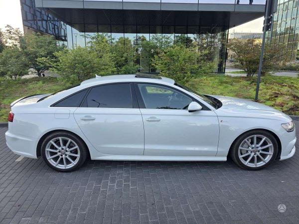 White Audi A6 2018 in Vilnius, with an engine capacity of 3.00 L and mileage of 174 thousand km for 15499 €, photo 7 on AUTOMOTO.COM.LV