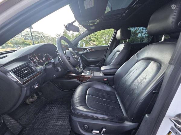 White Audi A6 2018 in Vilnius, with an engine capacity of 3.00 L and mileage of 174 thousand km for 15499 €, photo 9 on AUTOMOTO.COM.LV