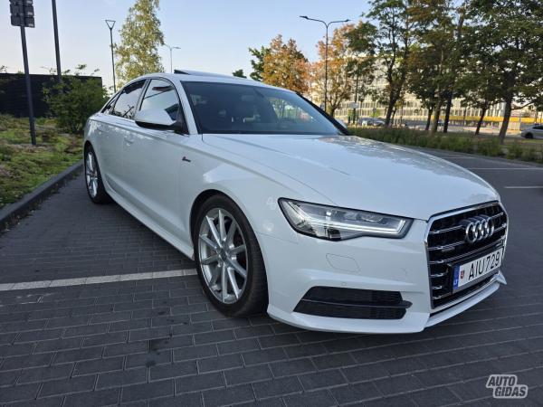 White Audi A6 2018 in Vilnius, with an engine capacity of 3.00 L and mileage of 174 thousand km for 15499 €, photo 2 on AUTOMOTO.COM.LV