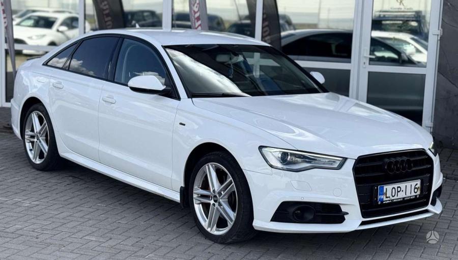 White Audi A6 2018 in Radviliskis, with an engine capacity of 2.00 L and mileage of 239 thousand km for 13650 €, photo 5 on AUTOMOTO.COM.LV