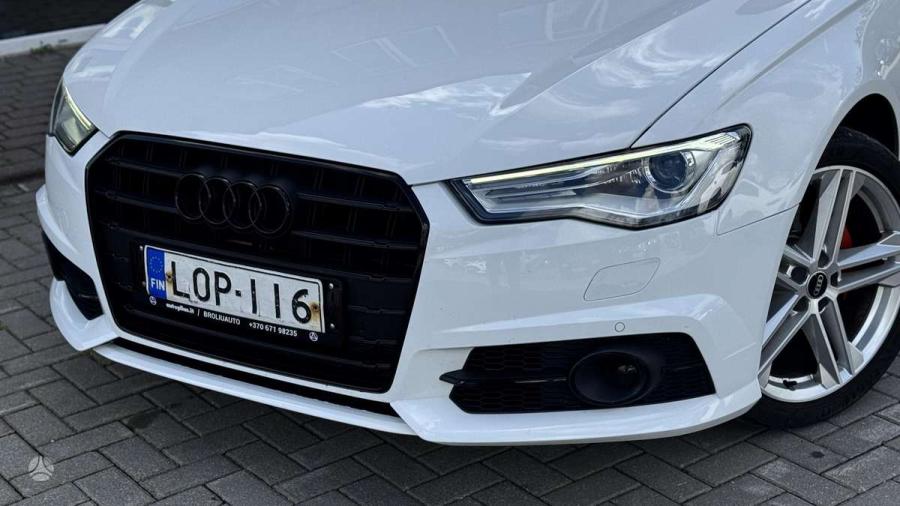 White Audi A6 2018 in Radviliskis, with an engine capacity of 2.00 L and mileage of 239 thousand km for 13650 €, photo 8 on AUTOMOTO.COM.LV