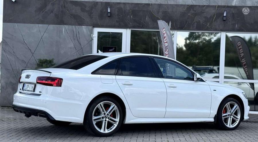 White Audi A6 2018 in Radviliskis, with an engine capacity of 2.00 L and mileage of 239 thousand km for 13650 €, photo 11 on AUTOMOTO.COM.LV