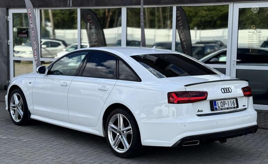 White Audi A6 2018 in Radviliskis, with an engine capacity of 2.00 L and mileage of 239 thousand km for 13650 €, photo 12 on AUTOMOTO.COM.LV