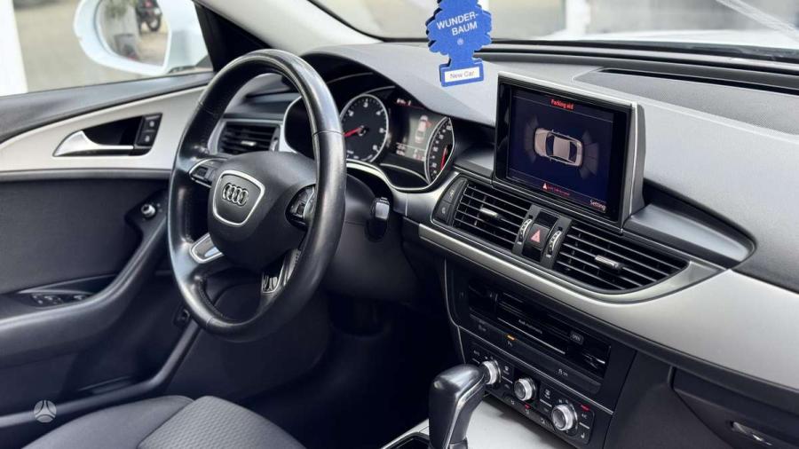 White Audi A6 2018 in Radviliskis, with an engine capacity of 2.00 L and mileage of 239 thousand km for 13650 €, photo 19 on AUTOMOTO.COM.LV