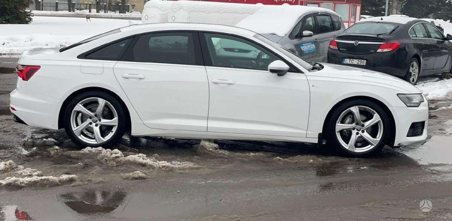 White Audi A6 2019 in Vievis, with an engine capacity of 1.97 L and mileage of 199 thousand km for 22750 €, photo 4 on AUTOMOTO.COM.LV