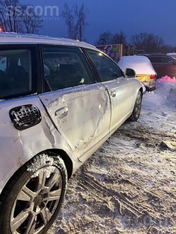 White Audi A6 2009 in Jurmala, with an engine capacity of 3.00 L and mileage of 312 thousand km for 2500 €, photo 8 on AUTOMOTO.COM.LV