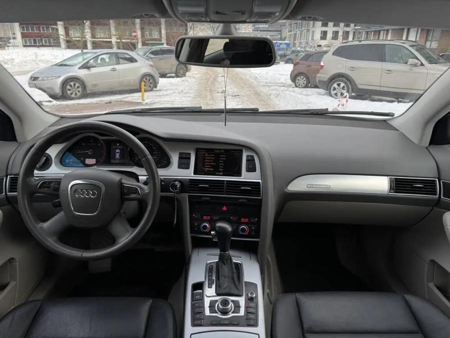 White Audi A6 2009 in Riga, with an engine capacity of 3.00 L and mileage of 313 thousand km for 6990 €, photo 6 on AUTOMOTO.COM.LV