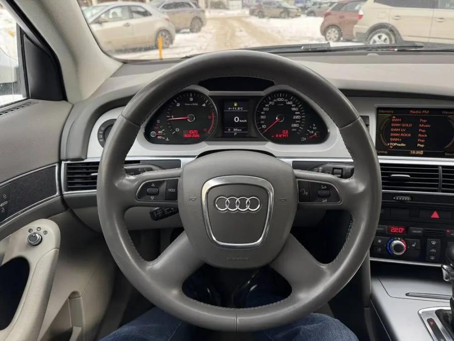 White Audi A6 2009 in Riga, with an engine capacity of 3.00 L and mileage of 313 thousand km for 6990 €, photo 9 on AUTOMOTO.COM.LV