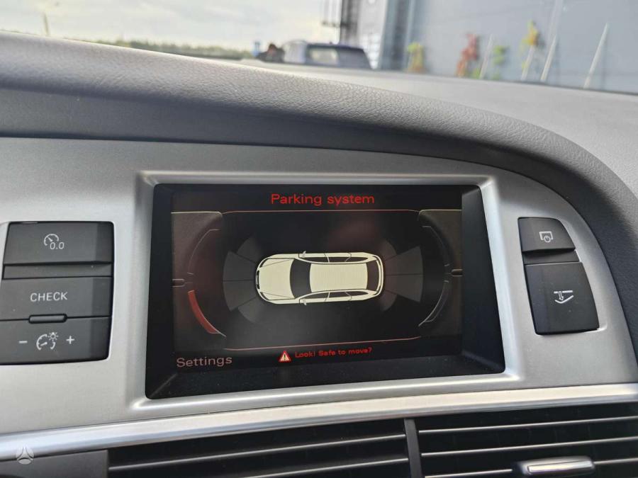 White Audi A6 2009 in Vilnius, with an engine capacity of 2.97 L and mileage of 291 thousand km for 6350 €, photo 29 on AUTOMOTO.COM.LV