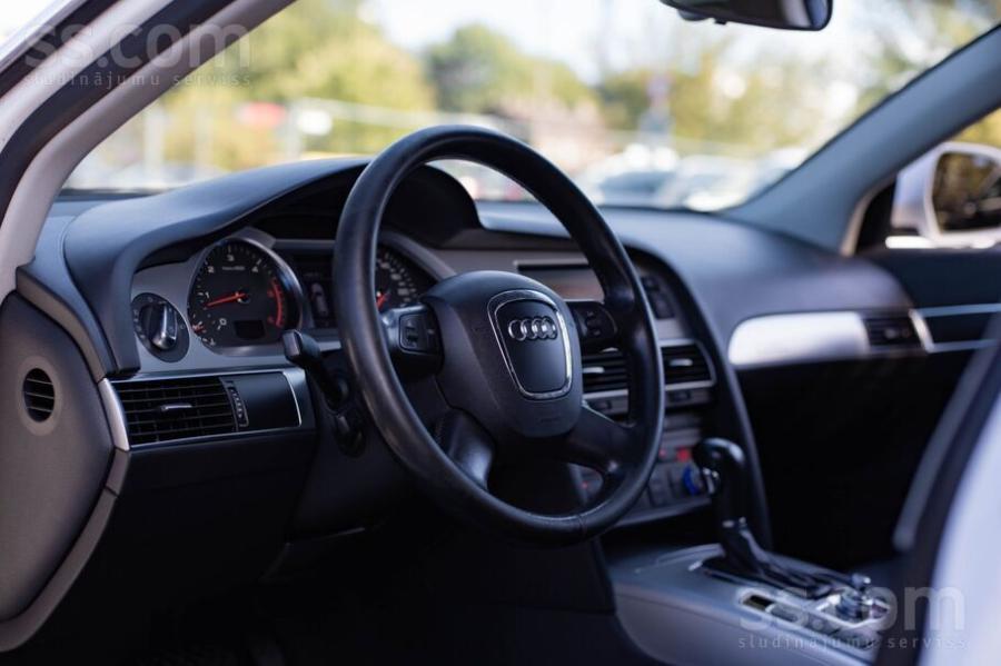 White Audi A6 2009 in Riga, with an engine capacity of 3.00 L and mileage of 334 thousand km for 6290 €, photo 14 on AUTOMOTO.COM.LV