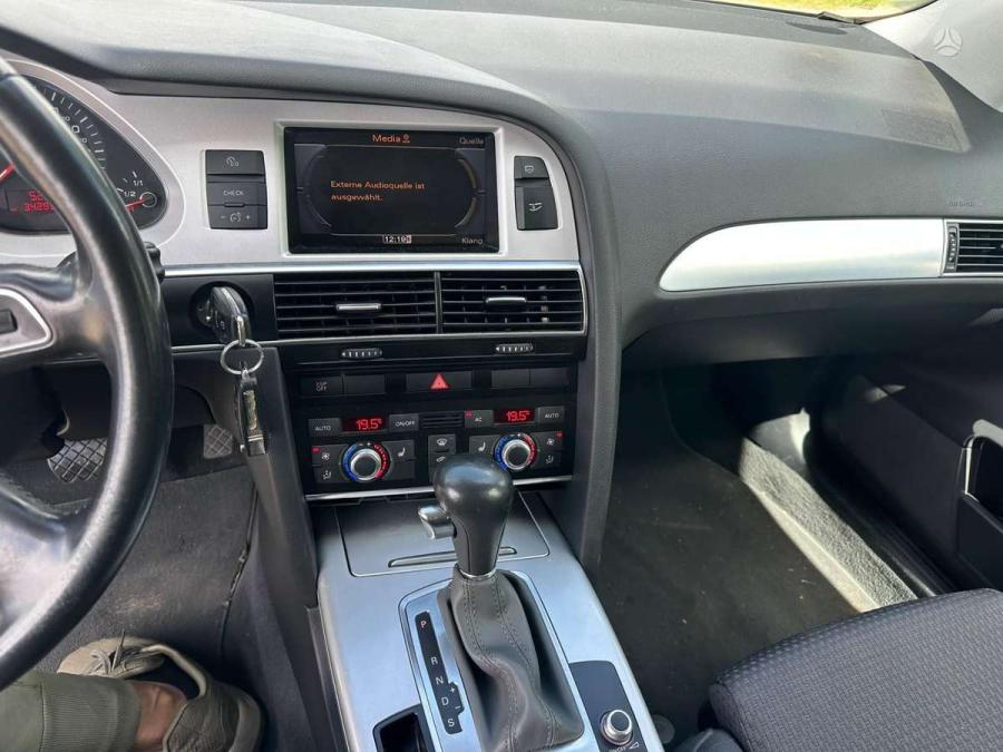 White Audi A6 2010 in Jurbarkas, with an engine capacity of 2.00 L and mileage of 300 thousand km for 3599 €, photo 16 on AUTOMOTO.COM.LV
