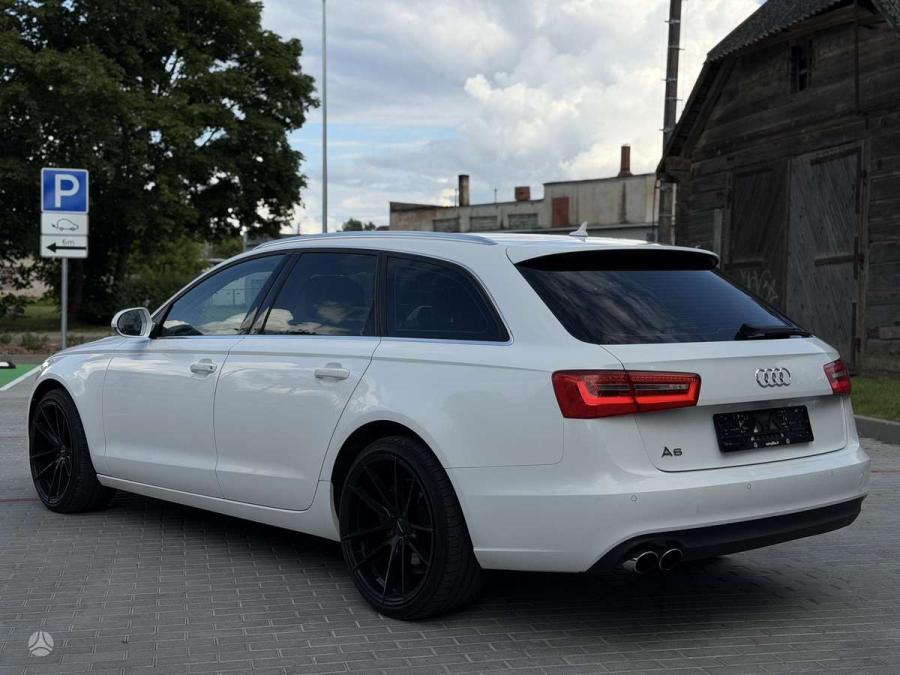 White Audi A6 2011 in Rokiskis, with an engine capacity of 1.97 L and mileage of 290 thousand km for 7750 €, photo 6 on AUTOMOTO.COM.LV