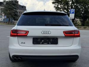 White Audi A6 2011 in Rokiskis, with an engine capacity of 1.97 L and mileage of 290 thousand km for 7750 €, photo 12 on AUTOMOTO.COM.LV