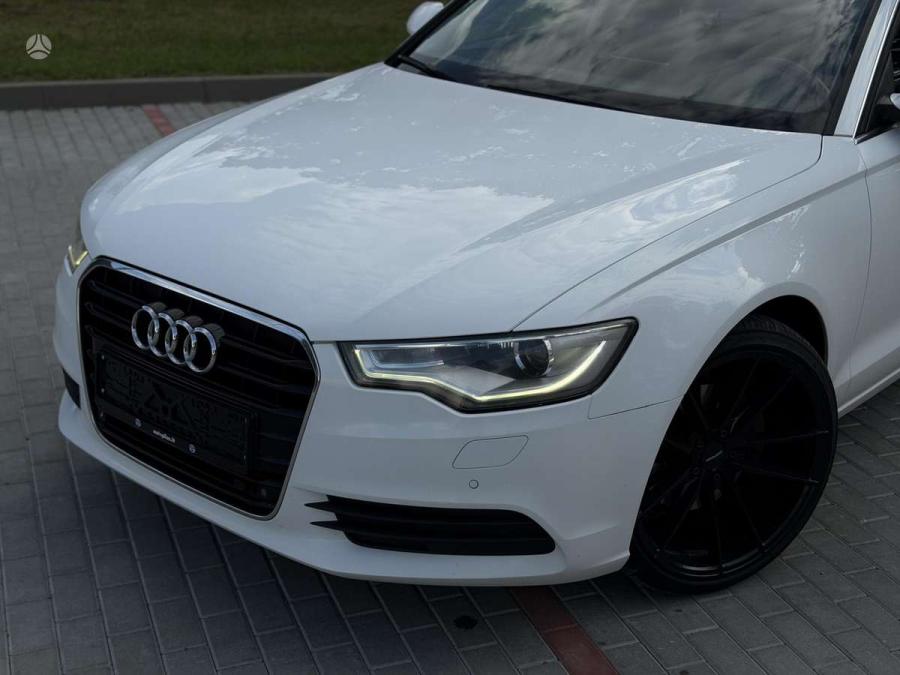 White Audi A6 2011 in Rokiskis, with an engine capacity of 1.97 L and mileage of 290 thousand km for 7750 €, photo 13 on AUTOMOTO.COM.LV