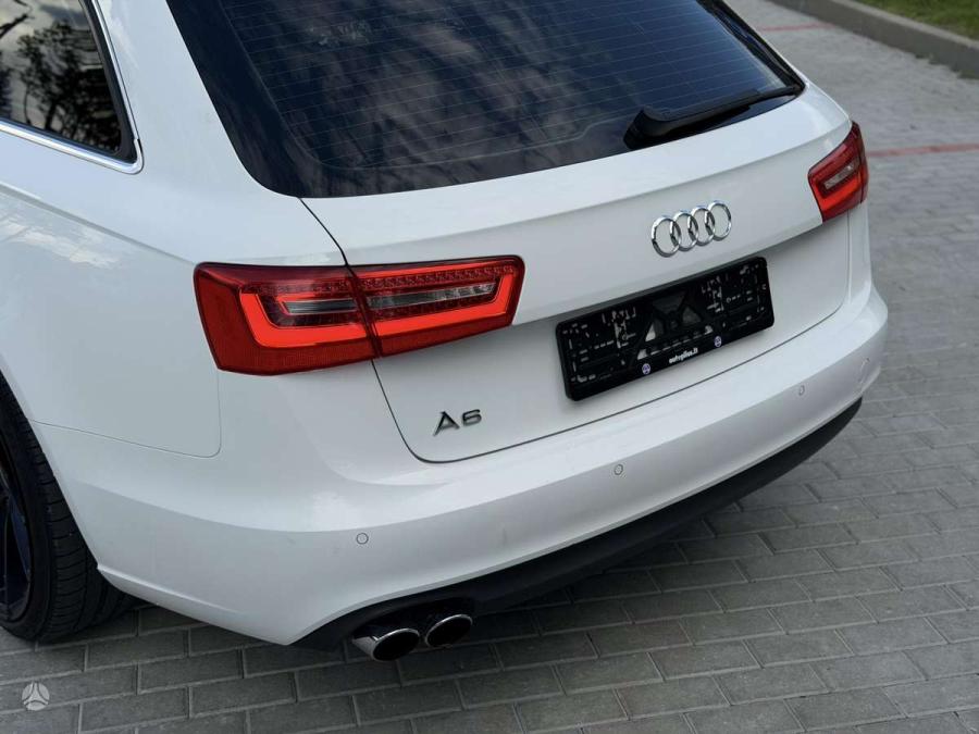 White Audi A6 2011 in Rokiskis, with an engine capacity of 1.97 L and mileage of 290 thousand km for 7750 €, photo 14 on AUTOMOTO.COM.LV