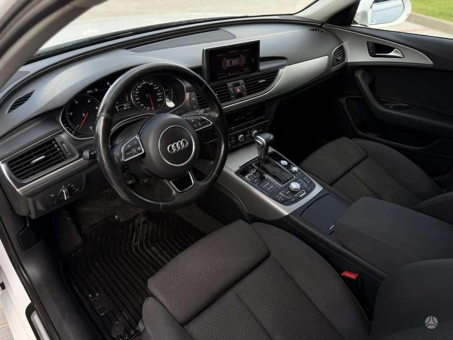 White Audi A6 2011 in Rokiskis, with an engine capacity of 1.97 L and mileage of 290 thousand km for 7750 €, photo 21 on AUTOMOTO.COM.LV