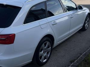 White Audi A6 2011 in Rokiskis, with an engine capacity of 1.97 L and mileage of 292 thousand km for 5950 €, photo 12 on AUTOMOTO.COM.LV