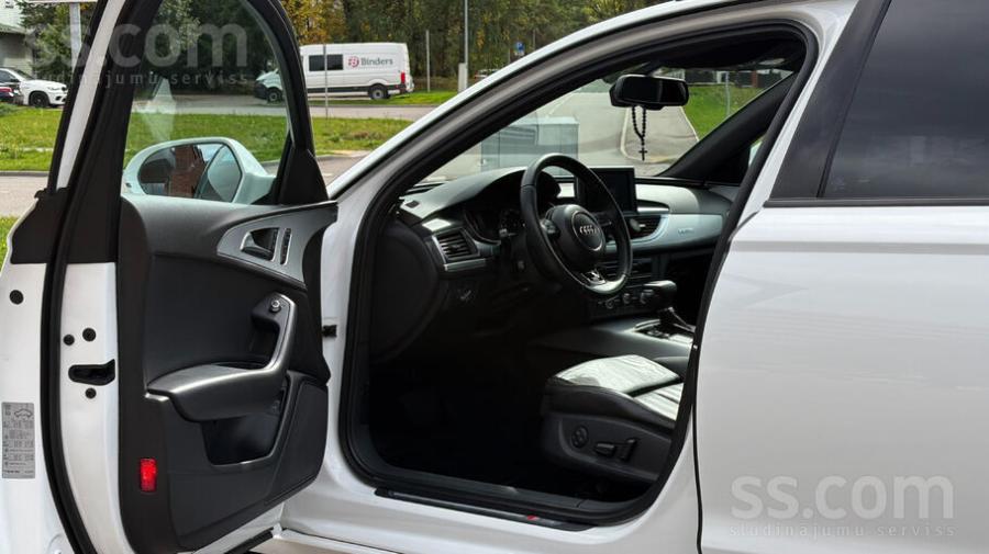 White Audi A6 2011 in Daugavpils, with an engine capacity of 3.00 L and mileage of 291 thousand km for 10950 €, photo 5 on AUTOMOTO.COM.LV