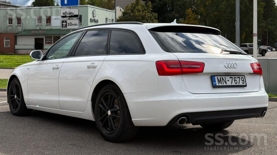 White Audi A6 2011 in Daugavpils, with an engine capacity of 3.00 L and mileage of 291 thousand km for 10950 €, photo 8 on AUTOMOTO.COM.LV