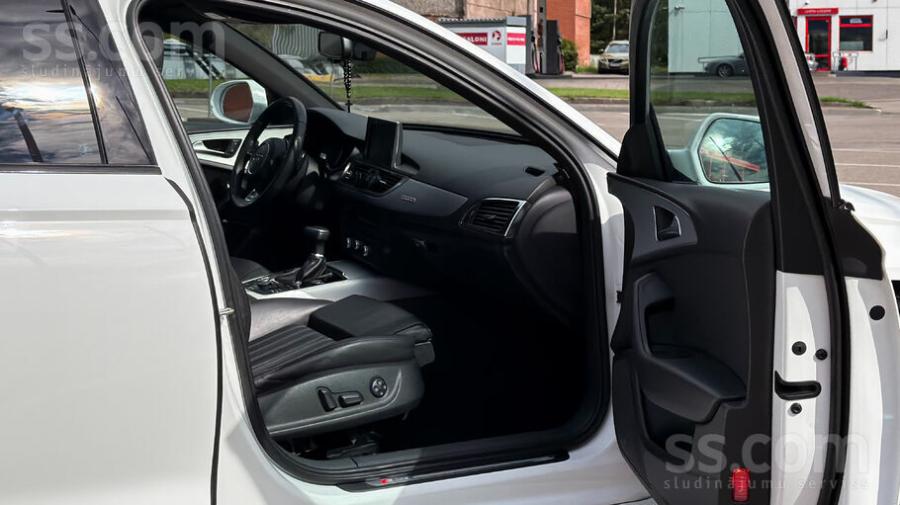 White Audi A6 2011 in Daugavpils, with an engine capacity of 3.00 L and mileage of 291 thousand km for 10950 €, photo 15 on AUTOMOTO.COM.LV