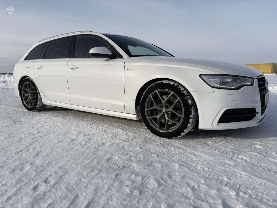 White Audi A6 2012 in Kedainiai, with an engine capacity of 3.00 L and mileage of 311 thousand km for 10900 €, photo 4 on AUTOMOTO.COM.LV