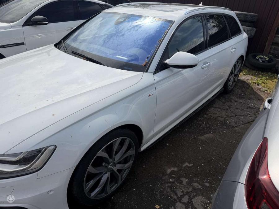 White Audi A6 2012 in Marijampole, with an engine capacity of 3.00 L and mileage of 281 thousand km for 8800 €, photo 5 on AUTOMOTO.COM.LV