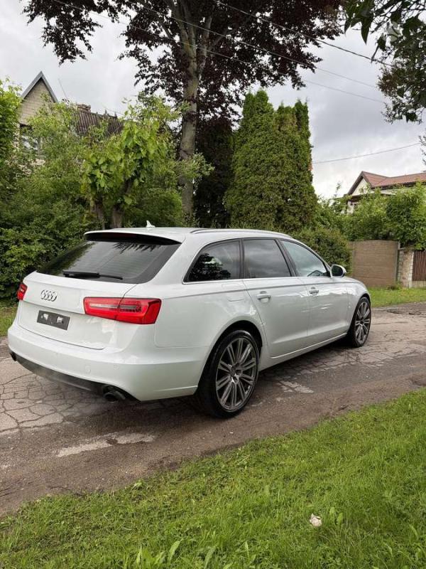 White Audi A6 2012 in Kaunas, with an engine capacity of 2.97 L and mileage of 320 thousand km for 8299 €, photo 6 on AUTOMOTO.COM.LV