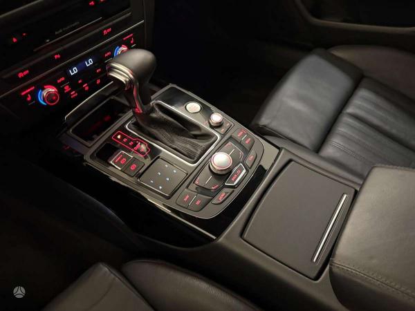 White Audi A6 2012 in Marijampole, with an engine capacity of 2.97 L and mileage of 262 thousand km for 12750 €, photo 4 on AUTOMOTO.COM.LV