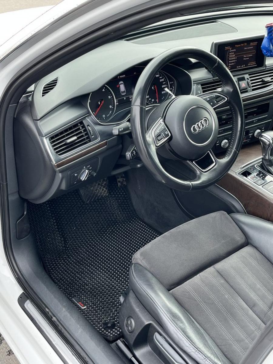 White Audi A6 2013 in Maardu, with an engine capacity of 3.00 L and mileage of 217 thousand km for 13700 €, photo 12 on AUTOMOTO.COM.LV